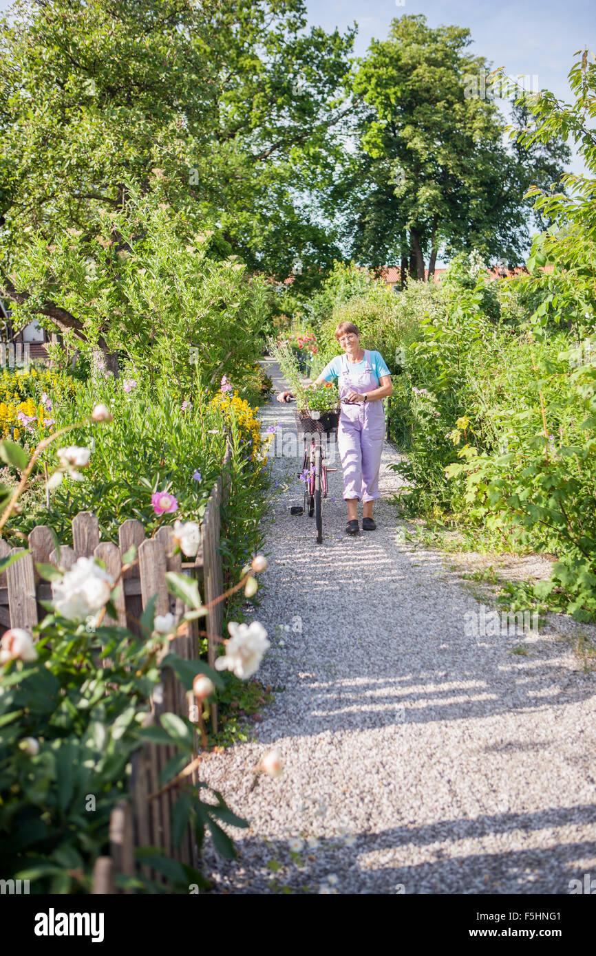Walking with bike hi-res stock photography and images - Alamy
