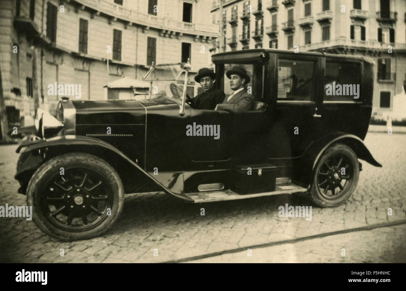 Two men in black hi-res stock photography and images - Alamy