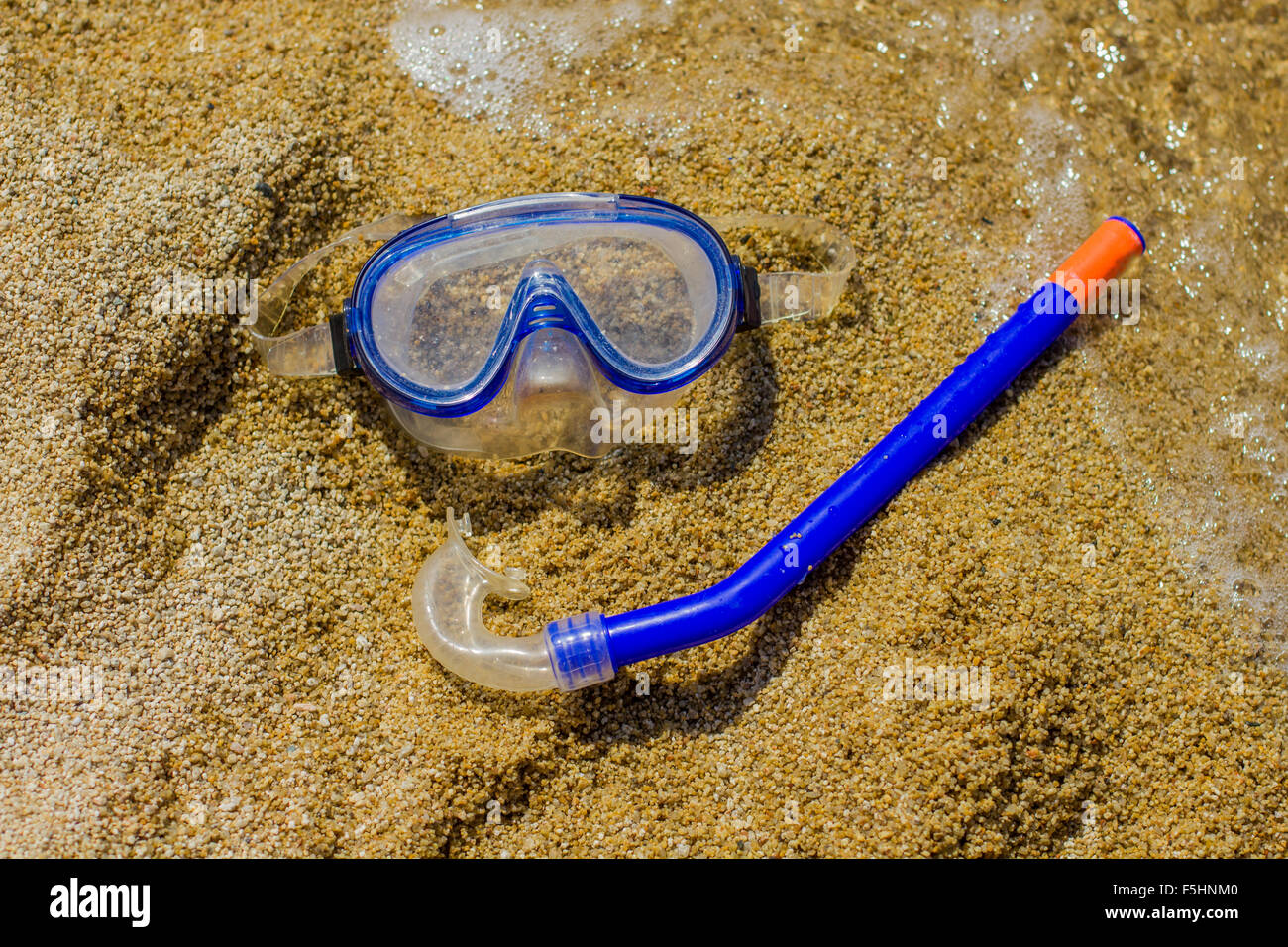 Diving Mask with Snorkel on sand beach. Summer recreation accessories ...