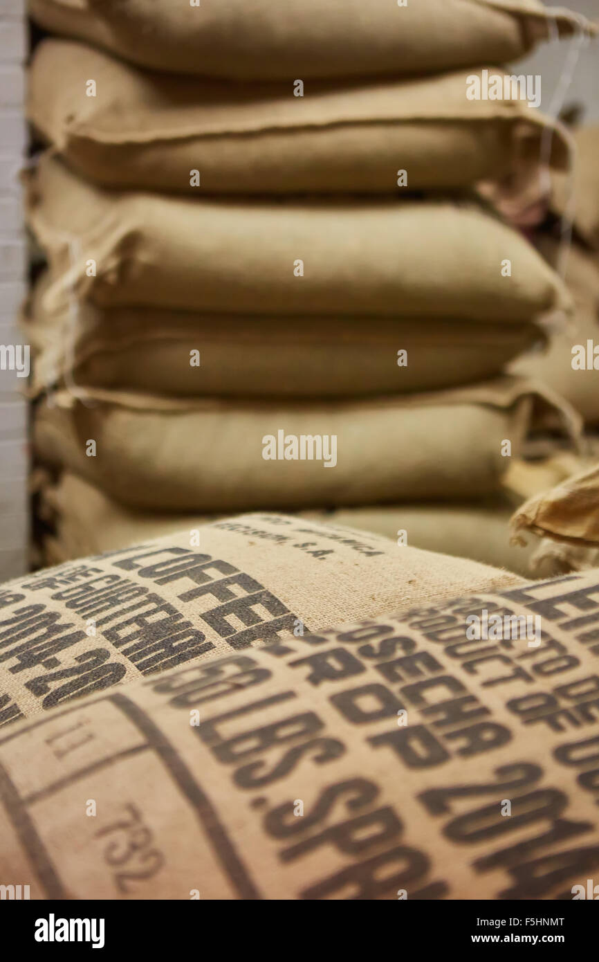 stack of burlap sacks with coffee beans Stock Photo - Alamy