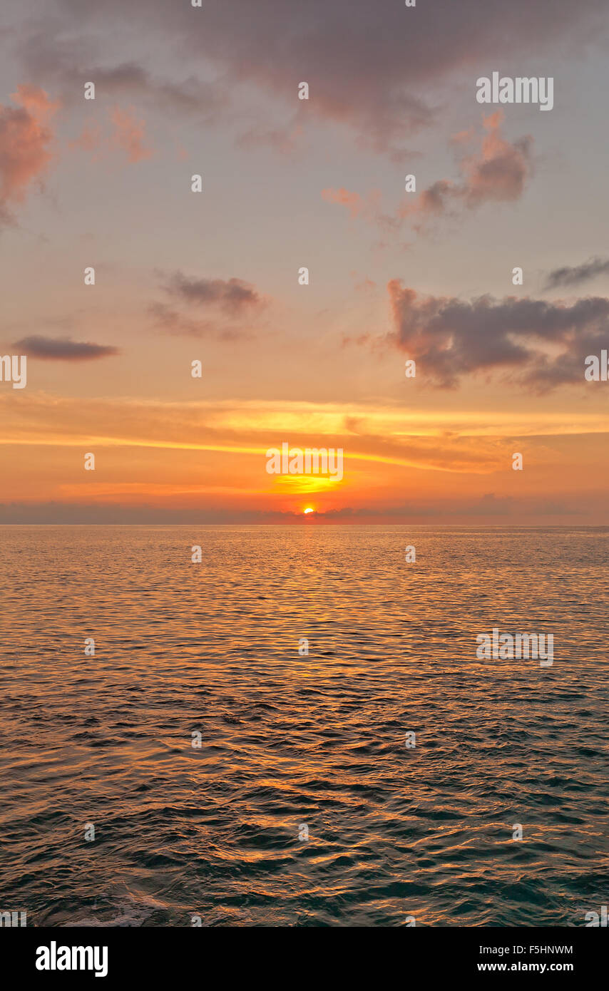 Sunset on the Caribbean seashore of Grand Cayman Island, Cayman Islands ...