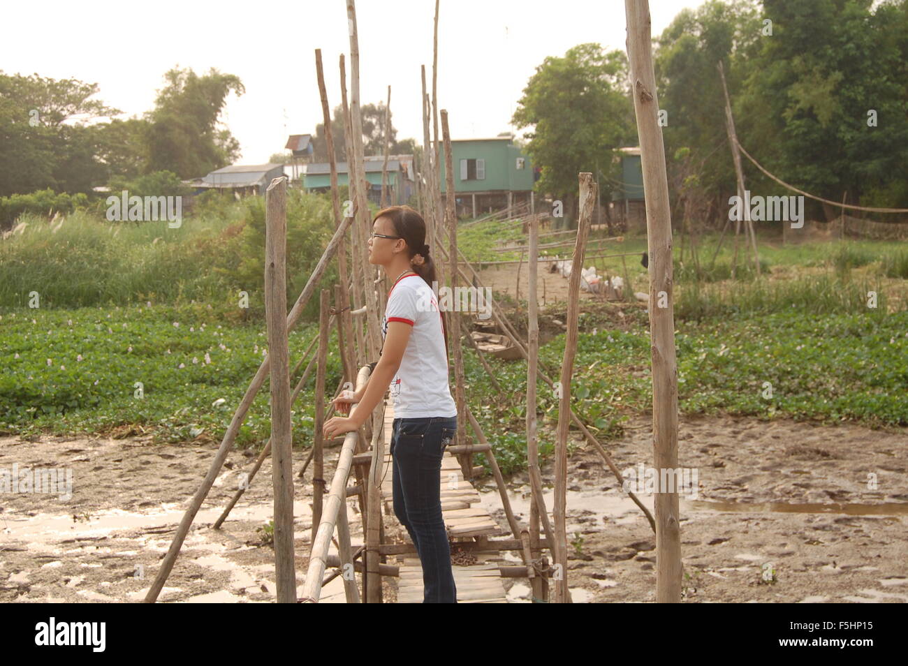 Young lady in Saigon village Vietnam Stock Photo - Alamy
