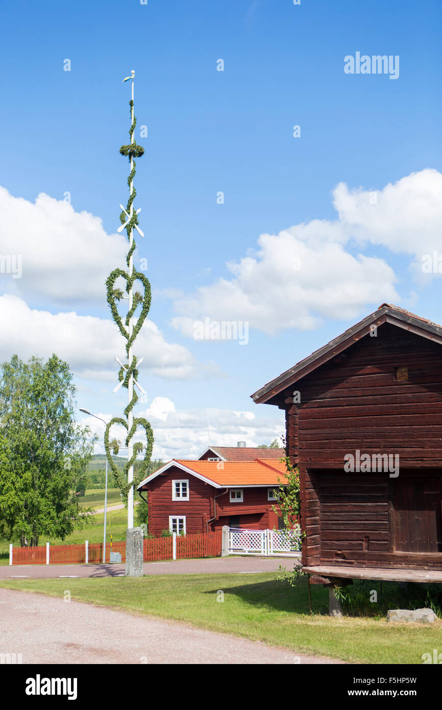 Sweden, Dalarna, Ralta, Spire with wreaths by village buildings Stock ...