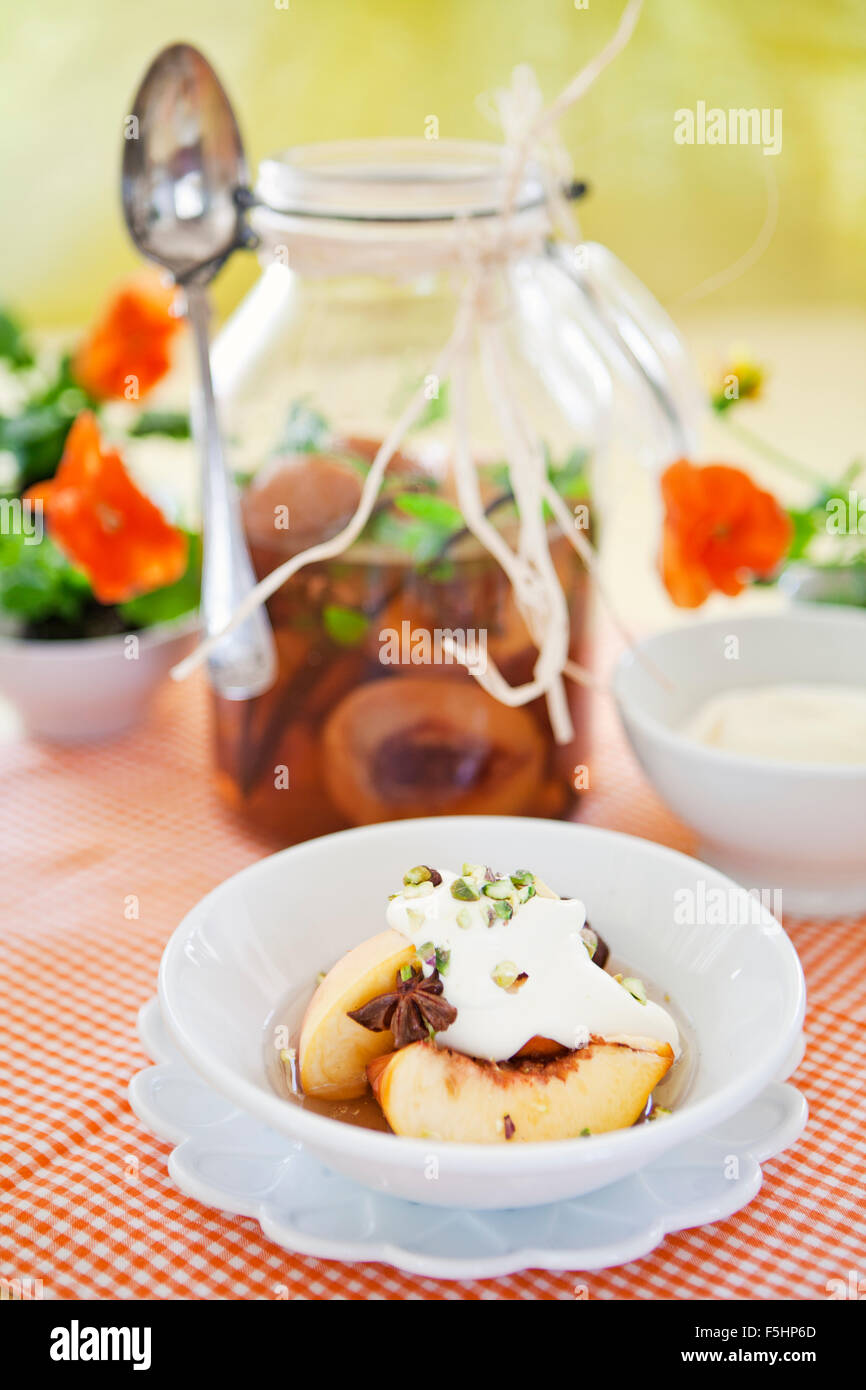 Sweden, Vanilla marinated peaches Stock Photo - Alamy