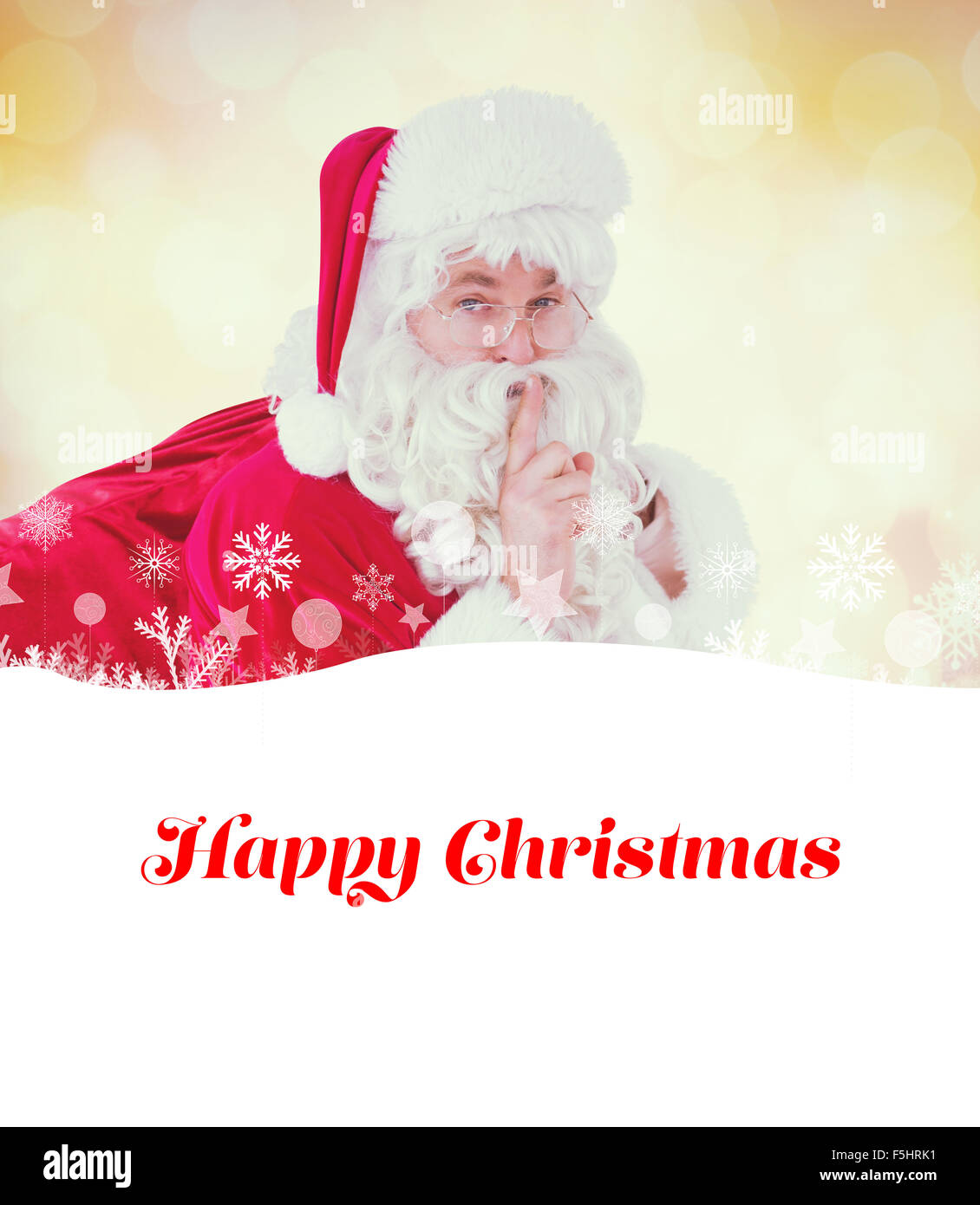 Composite image of santa keeping a secret and holding his sack Stock ...