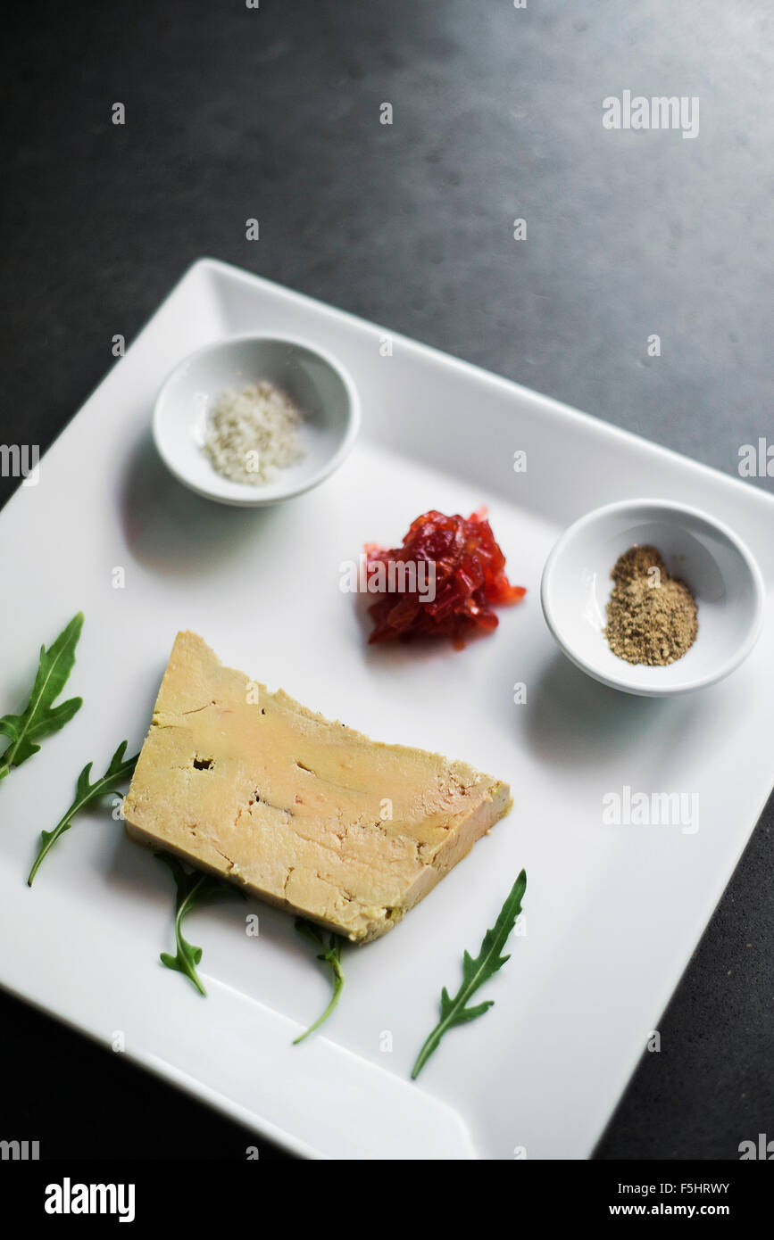 french foie gras appetizer starter on simple grey background Stock ...