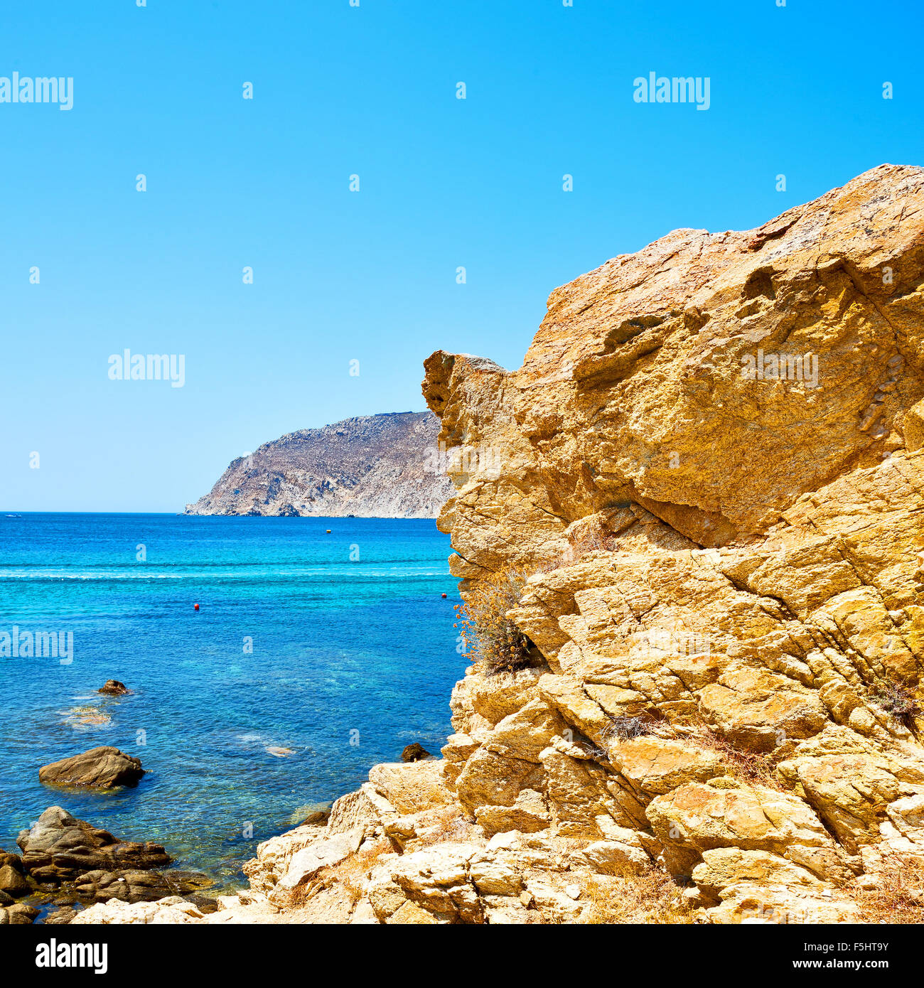 in greece the mykonos island rock sea and beach sky Stock Photo - Alamy