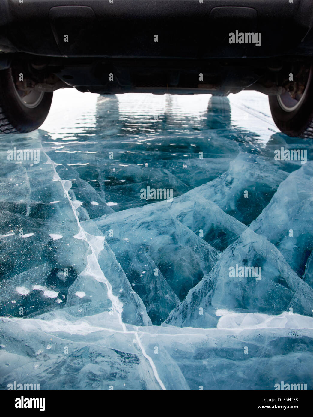 Off-road car rally on ice of lake Baikal in winter Stock Photo - Alamy
