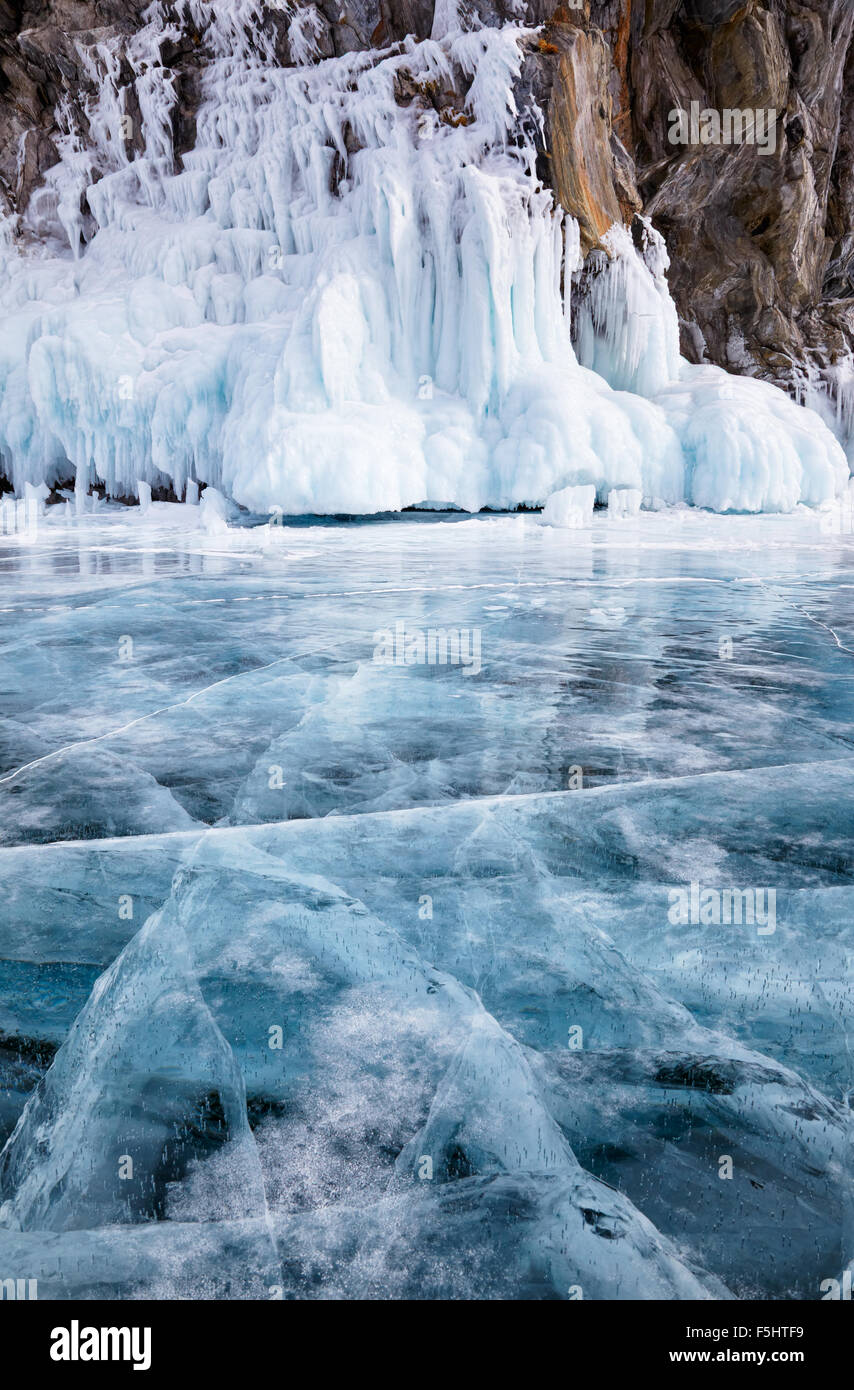 Rocks frozen into the ice of siberian Baikal Lake in winter Stock Photo ...