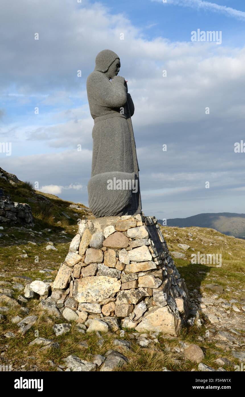 Statue of St Patrick at the summit of a rugged pilgrims trail Maumturk ...