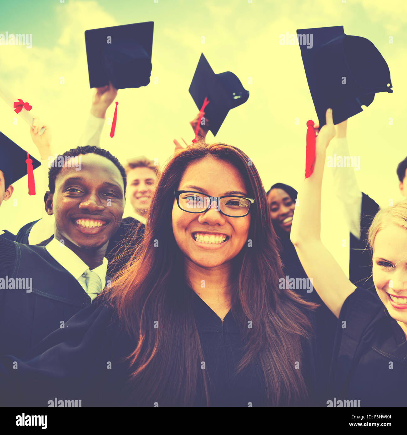Group of Diverse Students Celebrating Graduation Concept Stock Photo ...