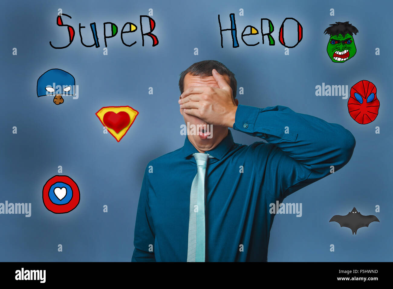 a man put his hand over the face of a businessman superhero supe Stock ...