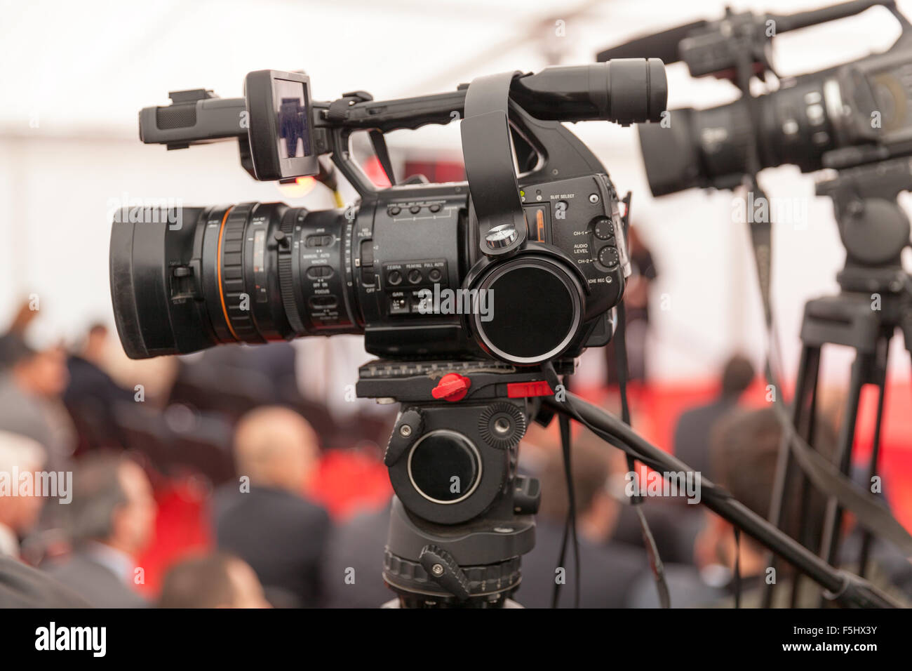 Covering an event with a video camera Stock Photo - Alamy