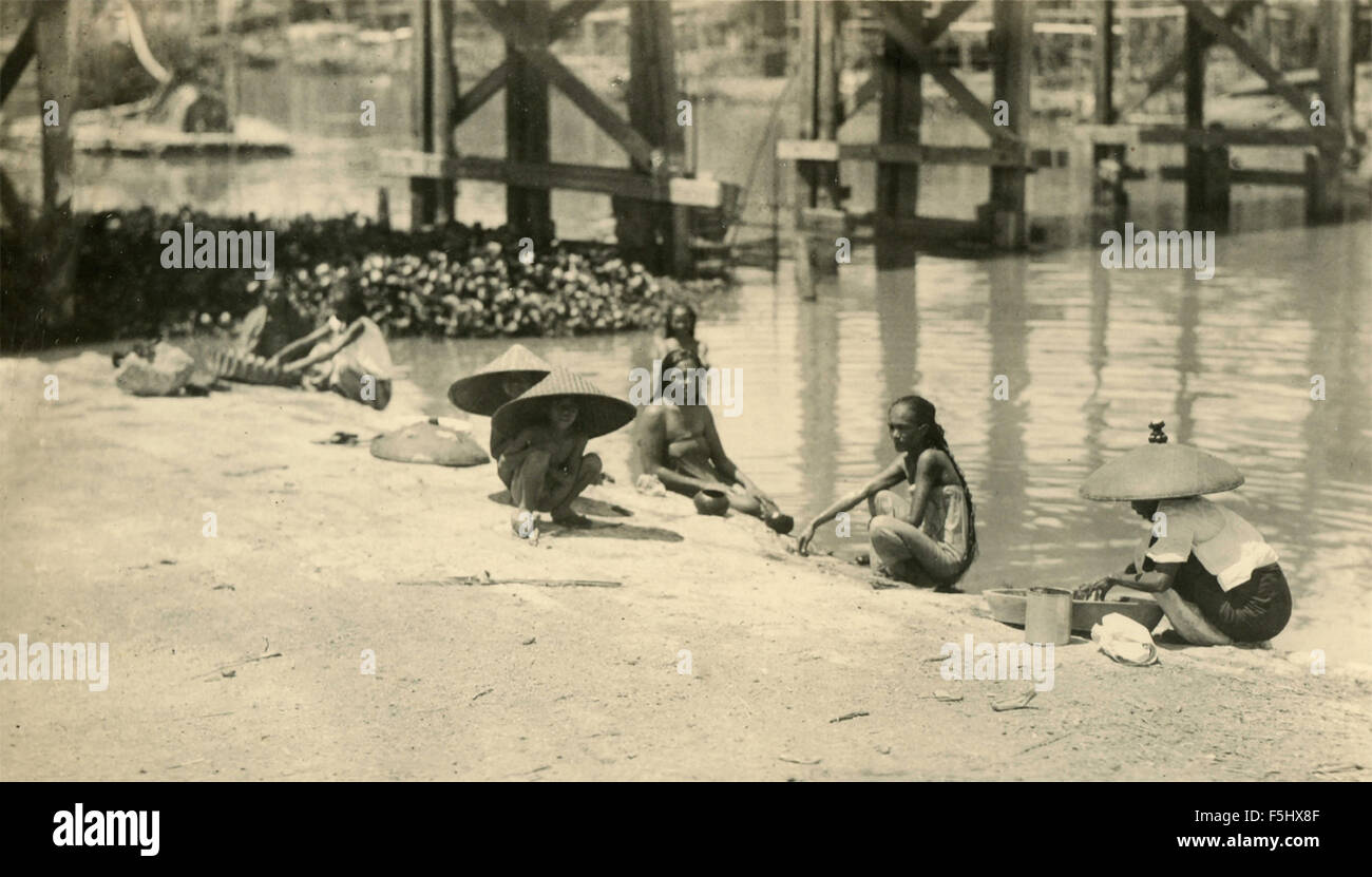 Women washing in river hi-res stock photography and images - Alamy