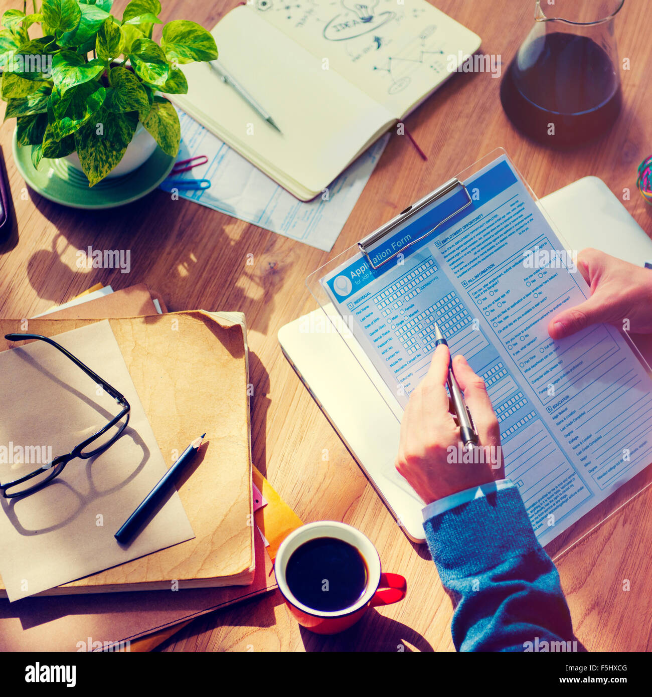 Filing application hi-res stock photography and images - Alamy