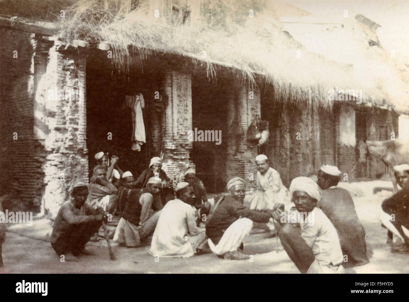 Group of indians sitting on the ground hi-res stock photography and ...