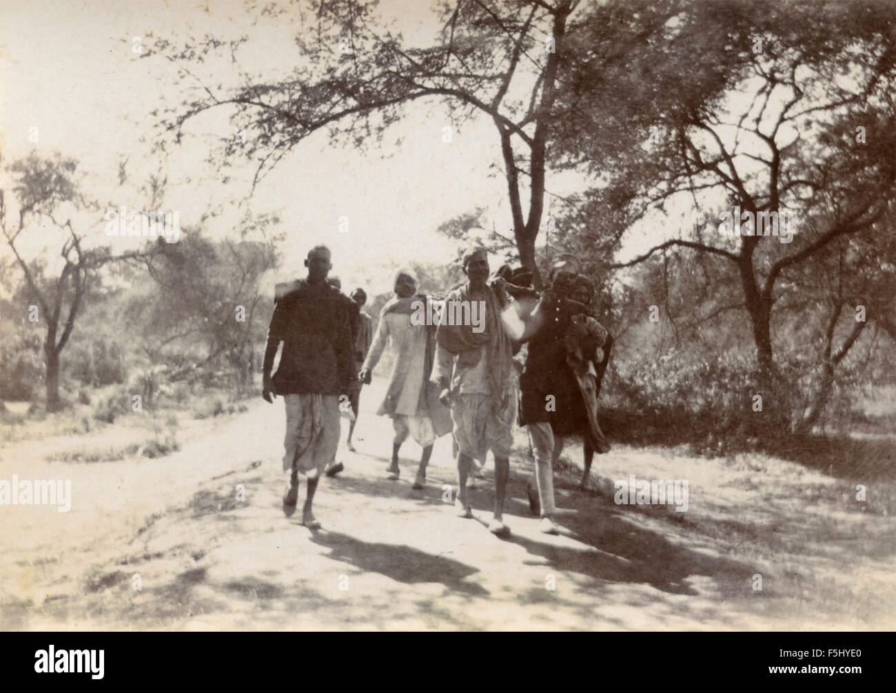 Group of indians walking on the street hi-res stock photography and ...
