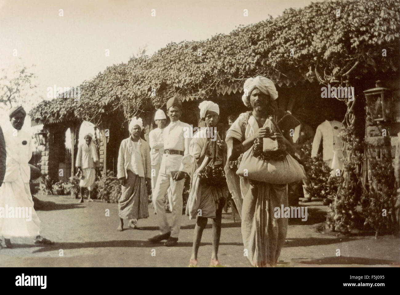 Group of indians walking on the street hi-res stock photography and ...