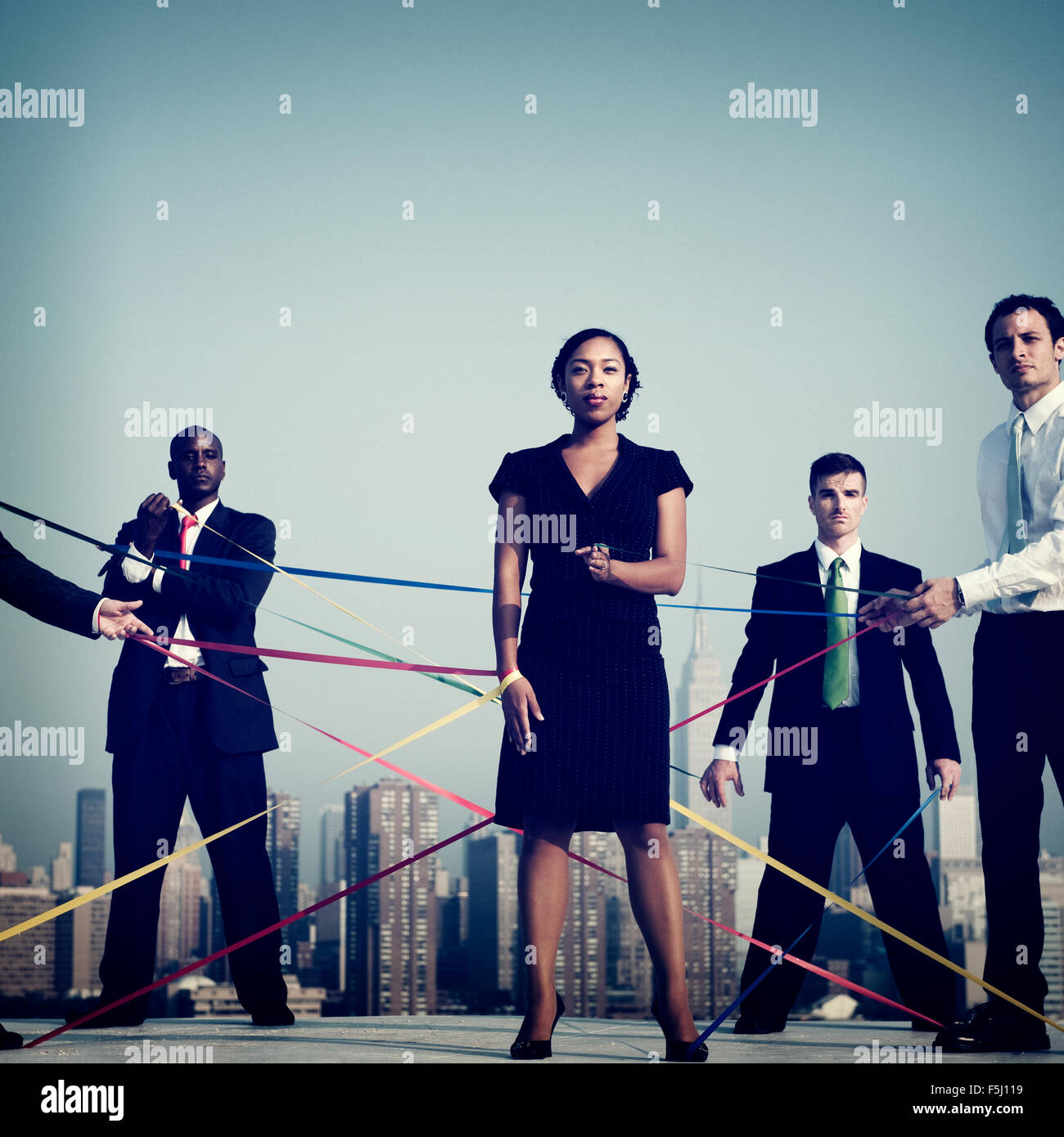 Business People Connected By Strings Concept Stock Photo - Alamy