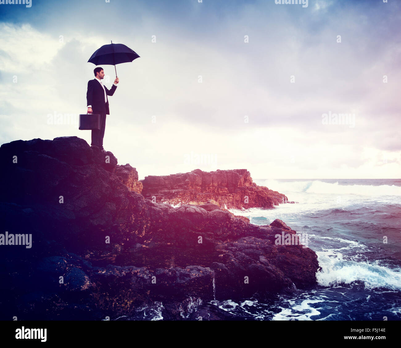 Lonely Businessman Standing by the Beach Concept Stock Photo - Alamy