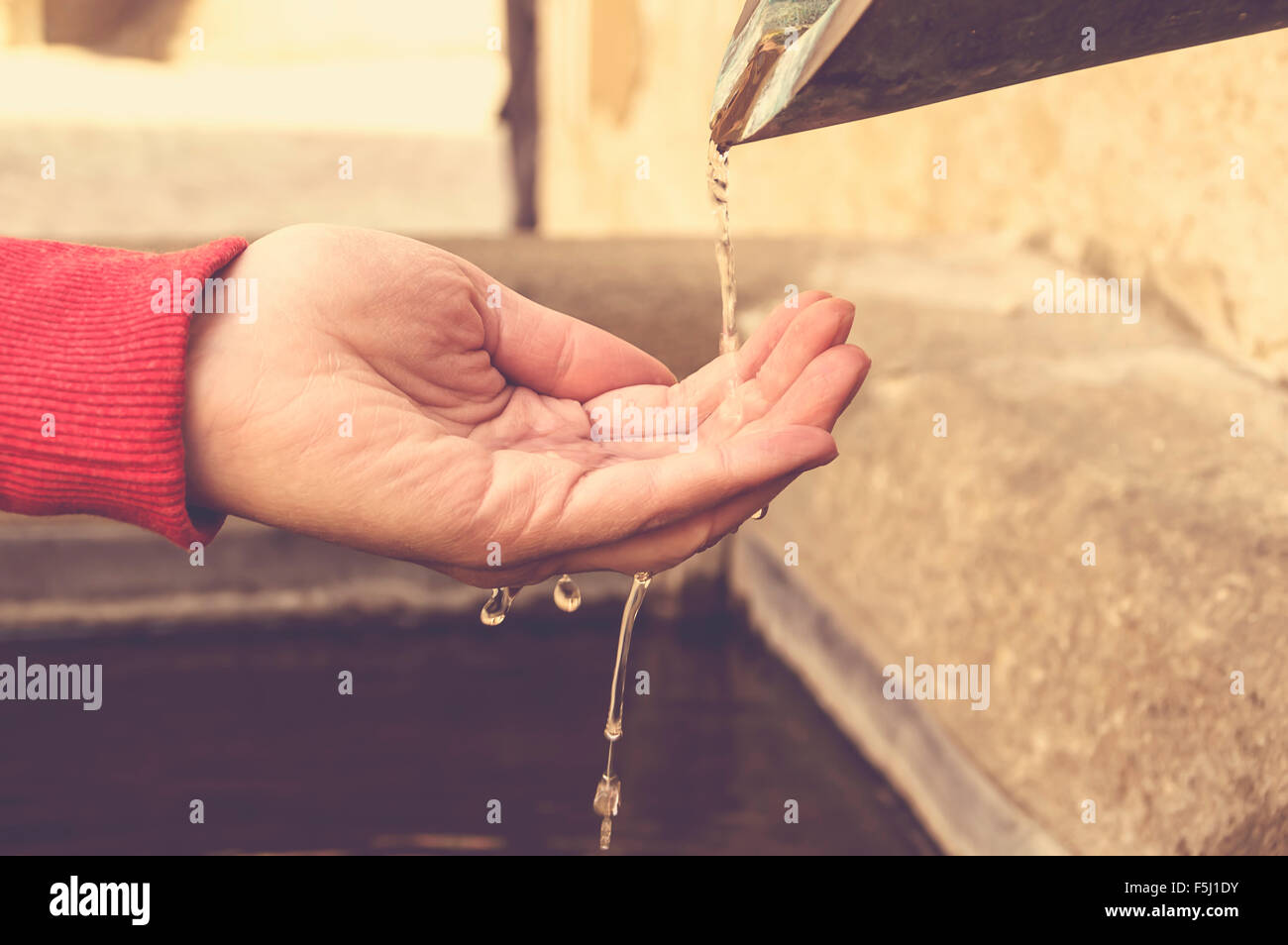 Hand running water hi-res stock photography and images - Alamy