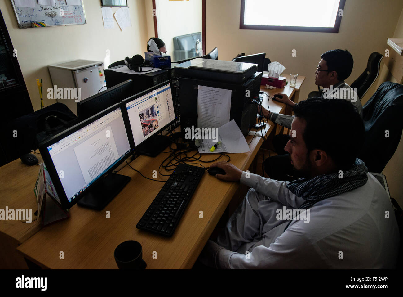 Working process in office of Kabul Pressistan Media Company, Kabul ...