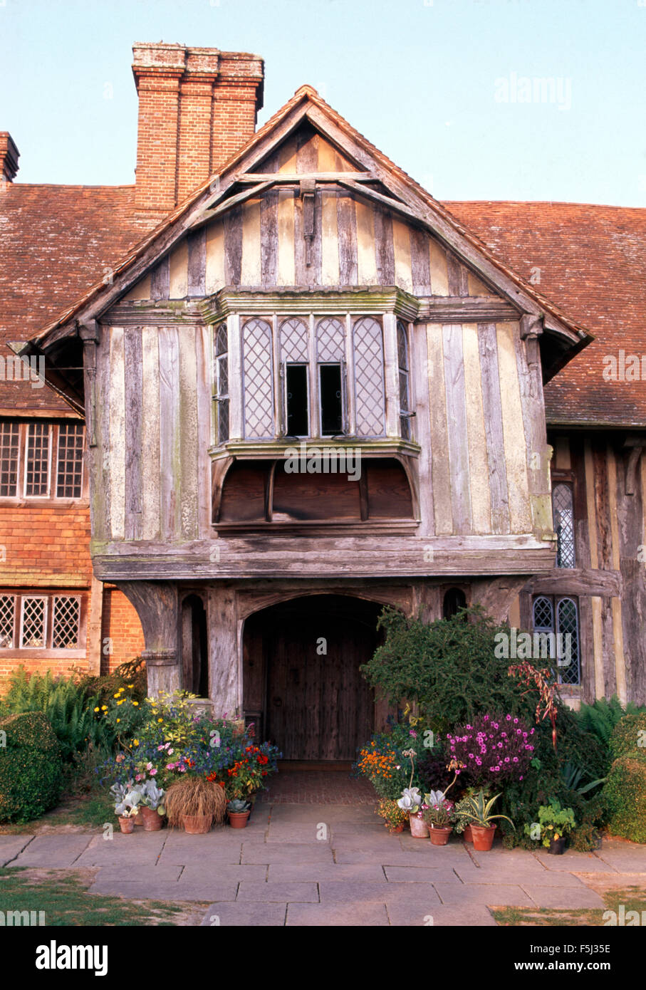 Exterior of a Tudor house with an Oriel window Stock Photo - Alamy