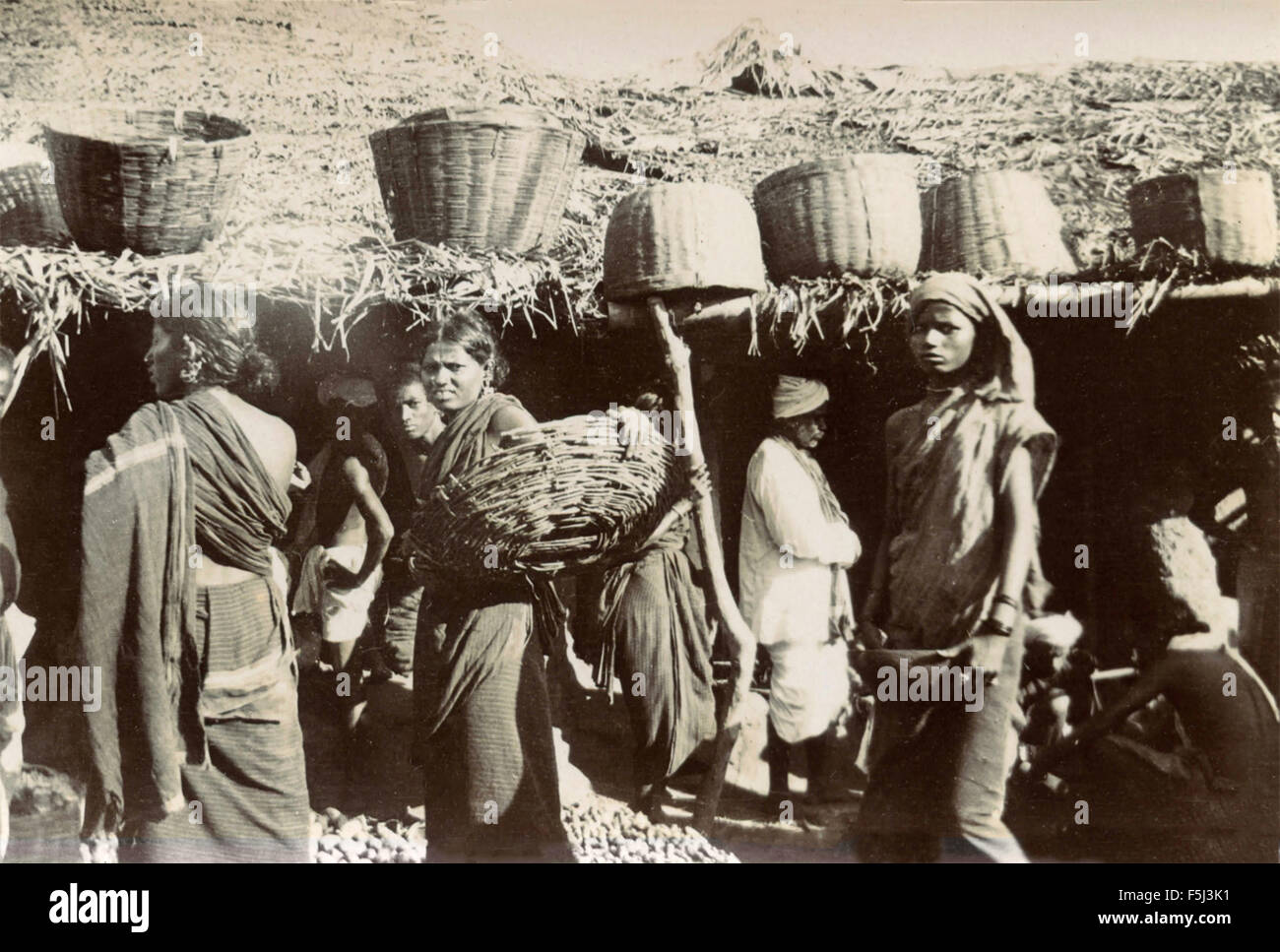 People next hut wicker baskets on roof hi-res stock photography and ...