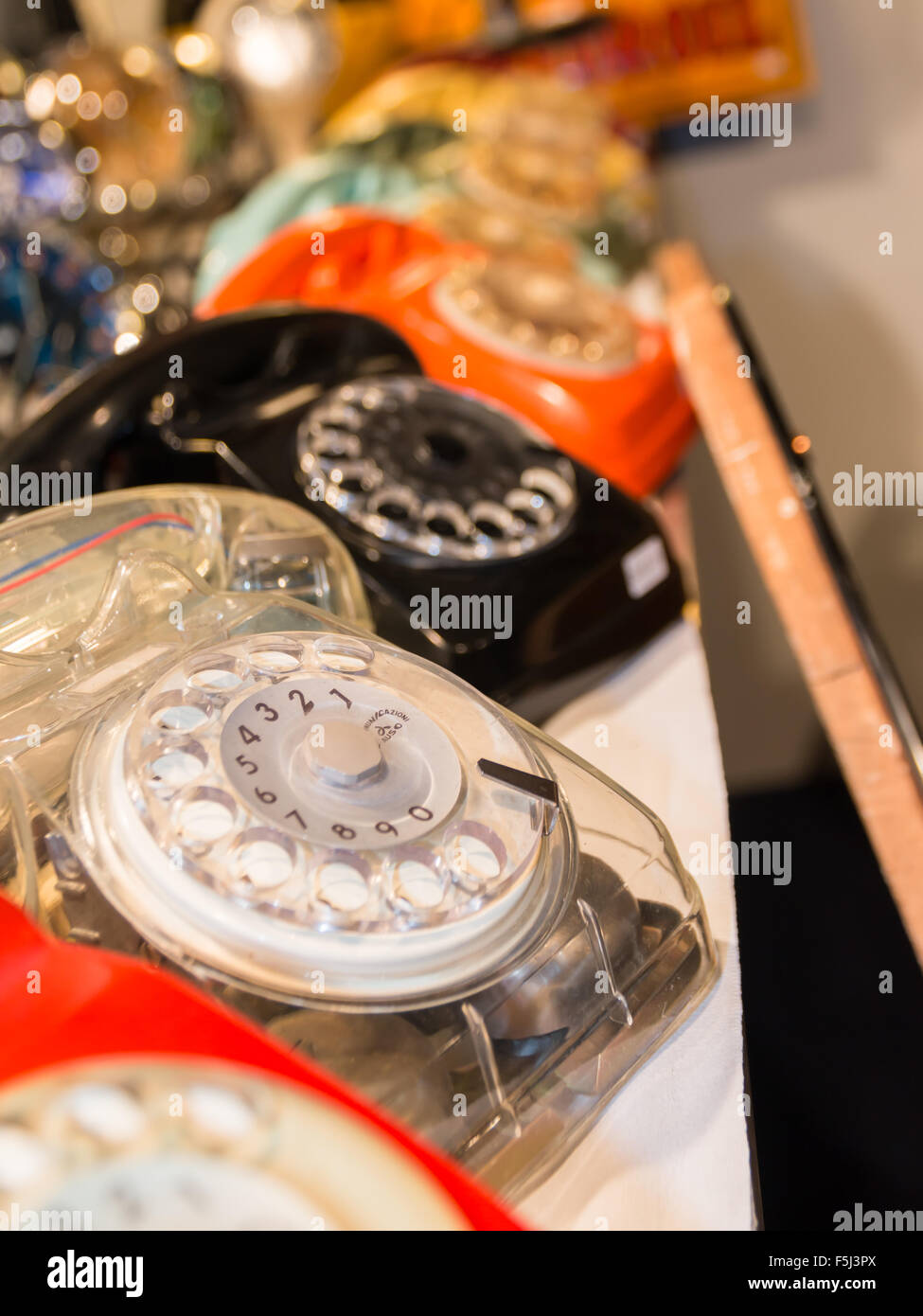 vintage colorful and aligned telephones with handset Stock Photo - Alamy