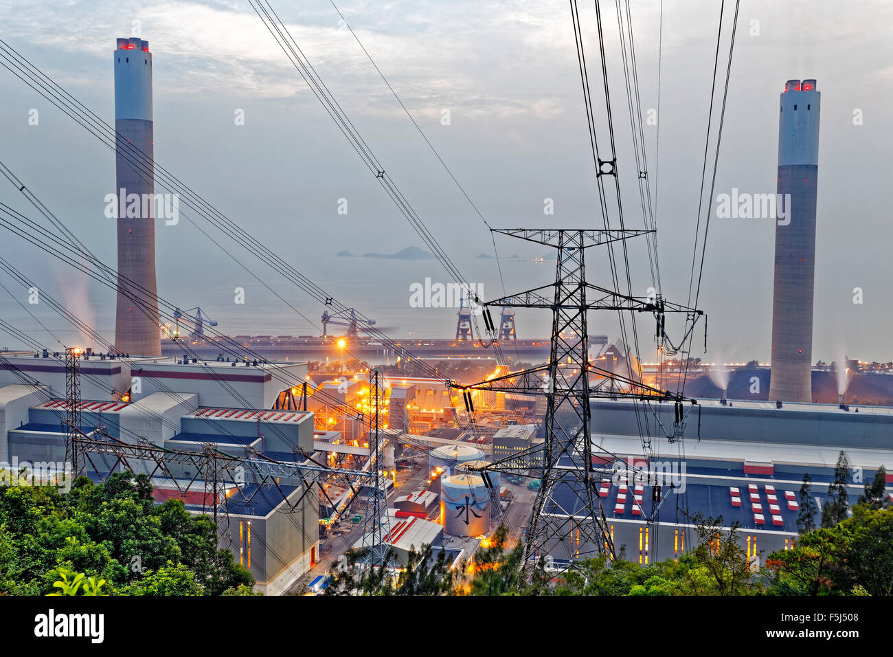 Power station and tower grey cloud Stock Photo - Alamy