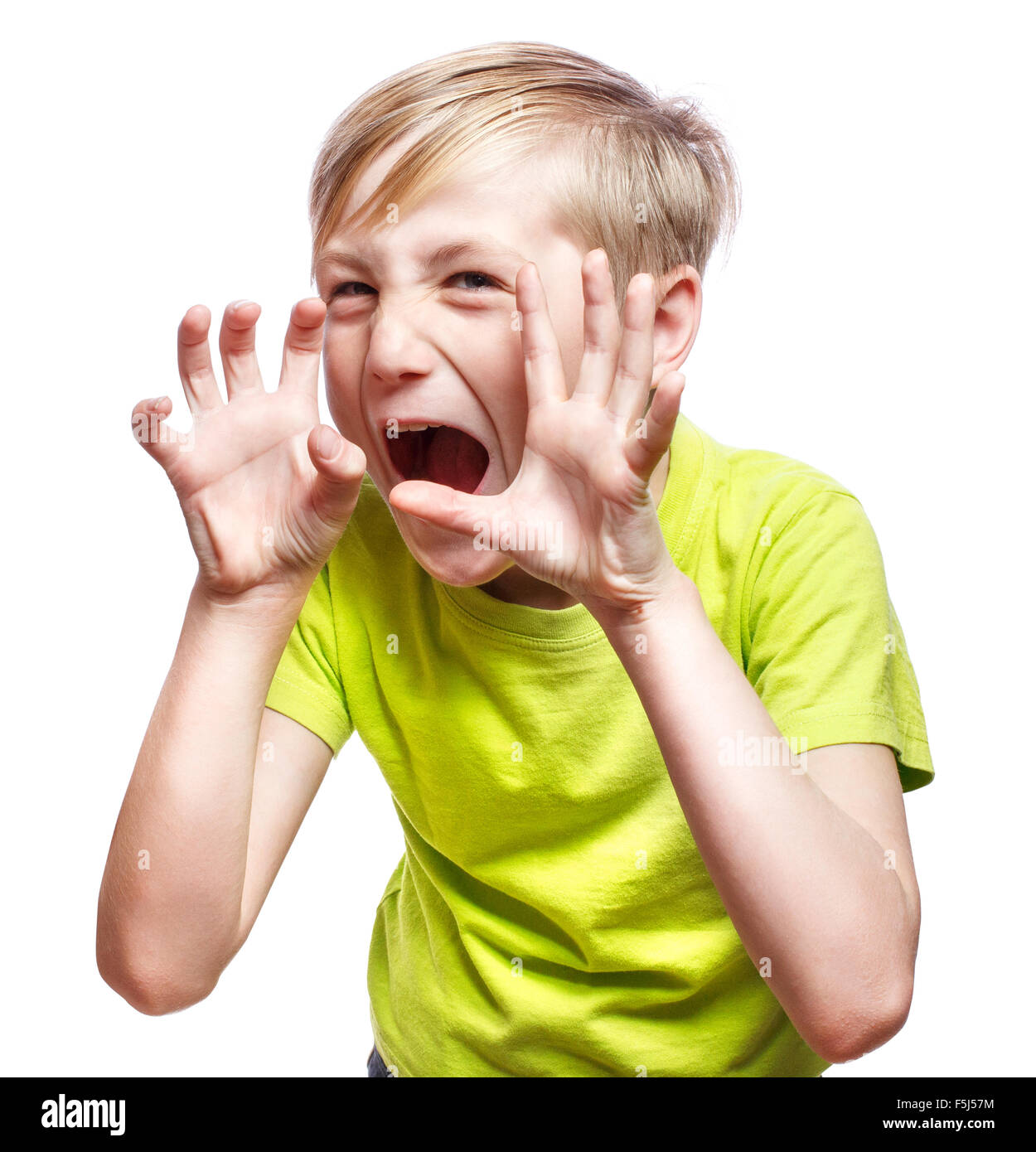 Scary boy using fingers to scare Stock Photo - Alamy