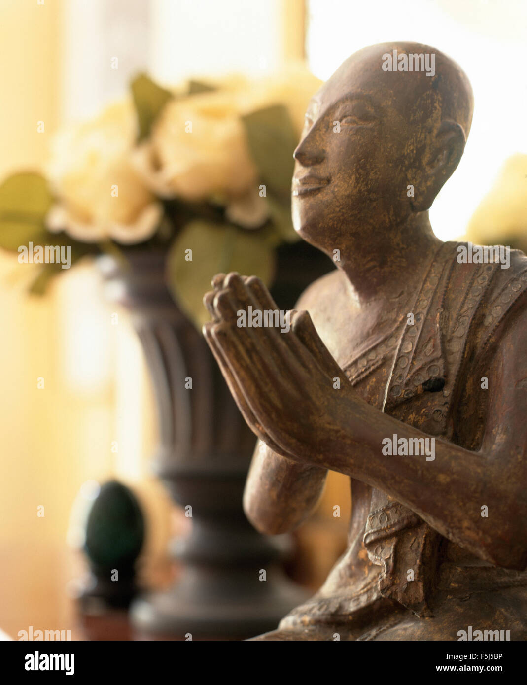 Close-up of an Asian Buddha-like statue Stock Photo - Alamy