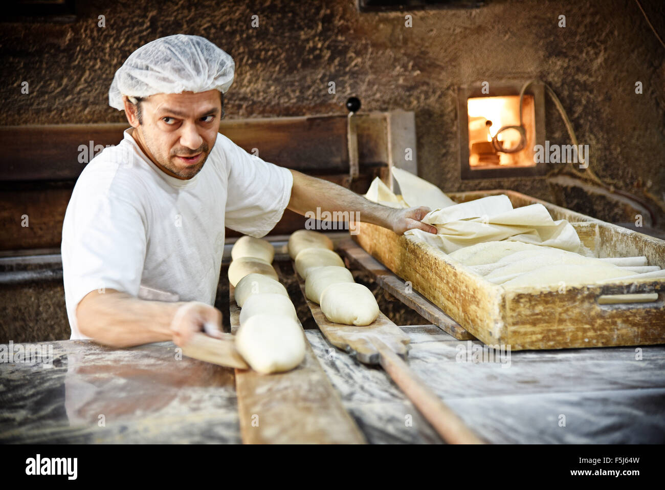 Selcuk Turkey Baker preparing bread dough Stock Photo - Alamy