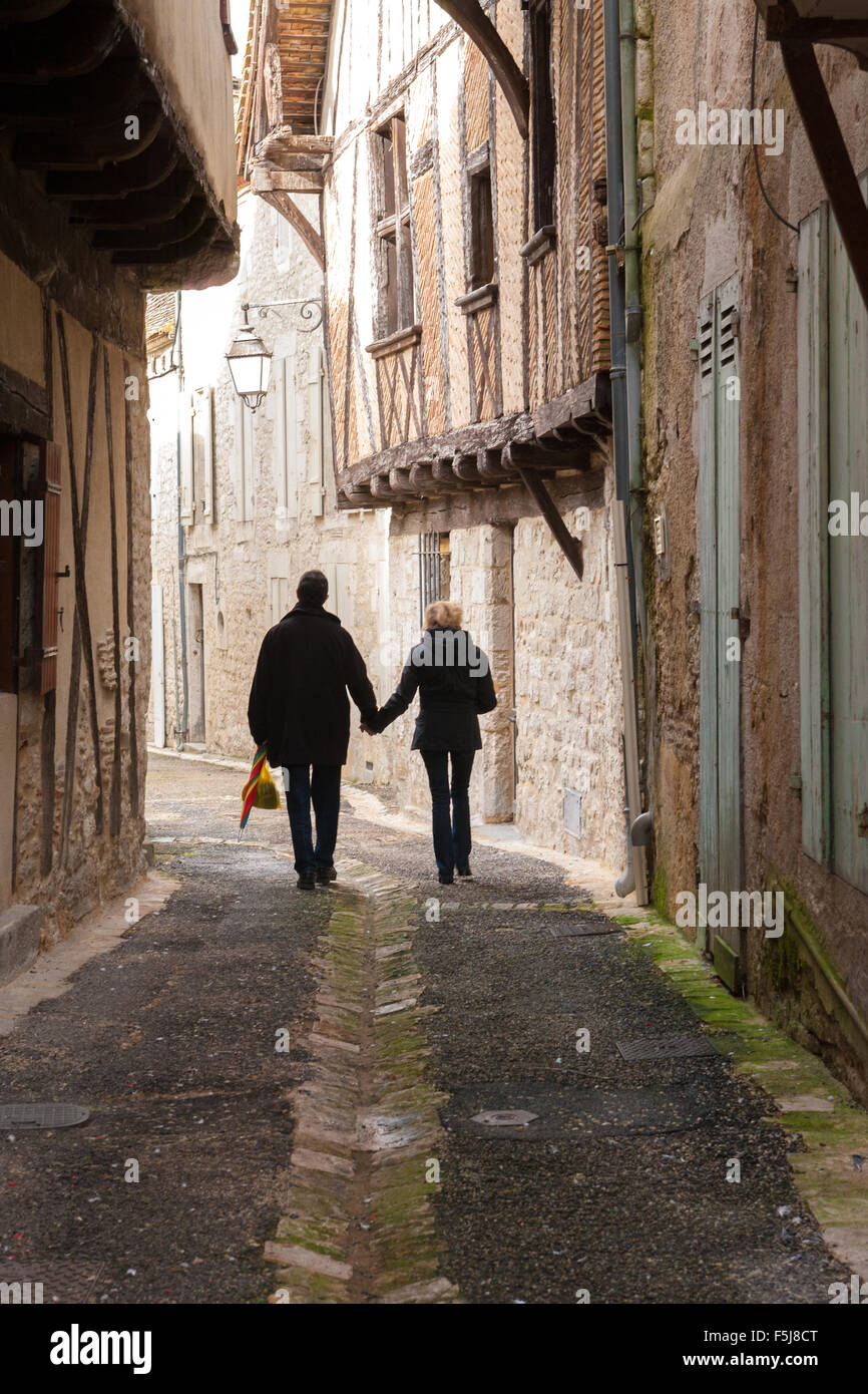 Old man walking down street hi-res stock photography and images - Alamy