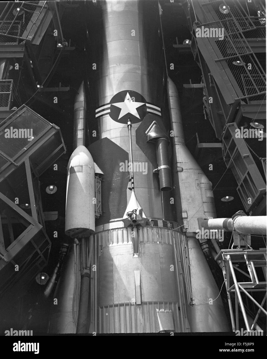 Image depicting the installation of a scientific passenger pod at Pad ...