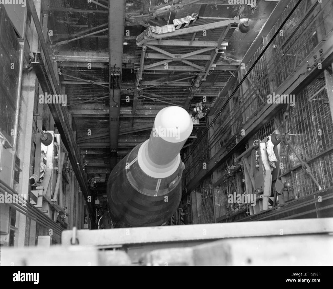 The Atlas rocket is shown in its silo, ready for launch, a critical ...