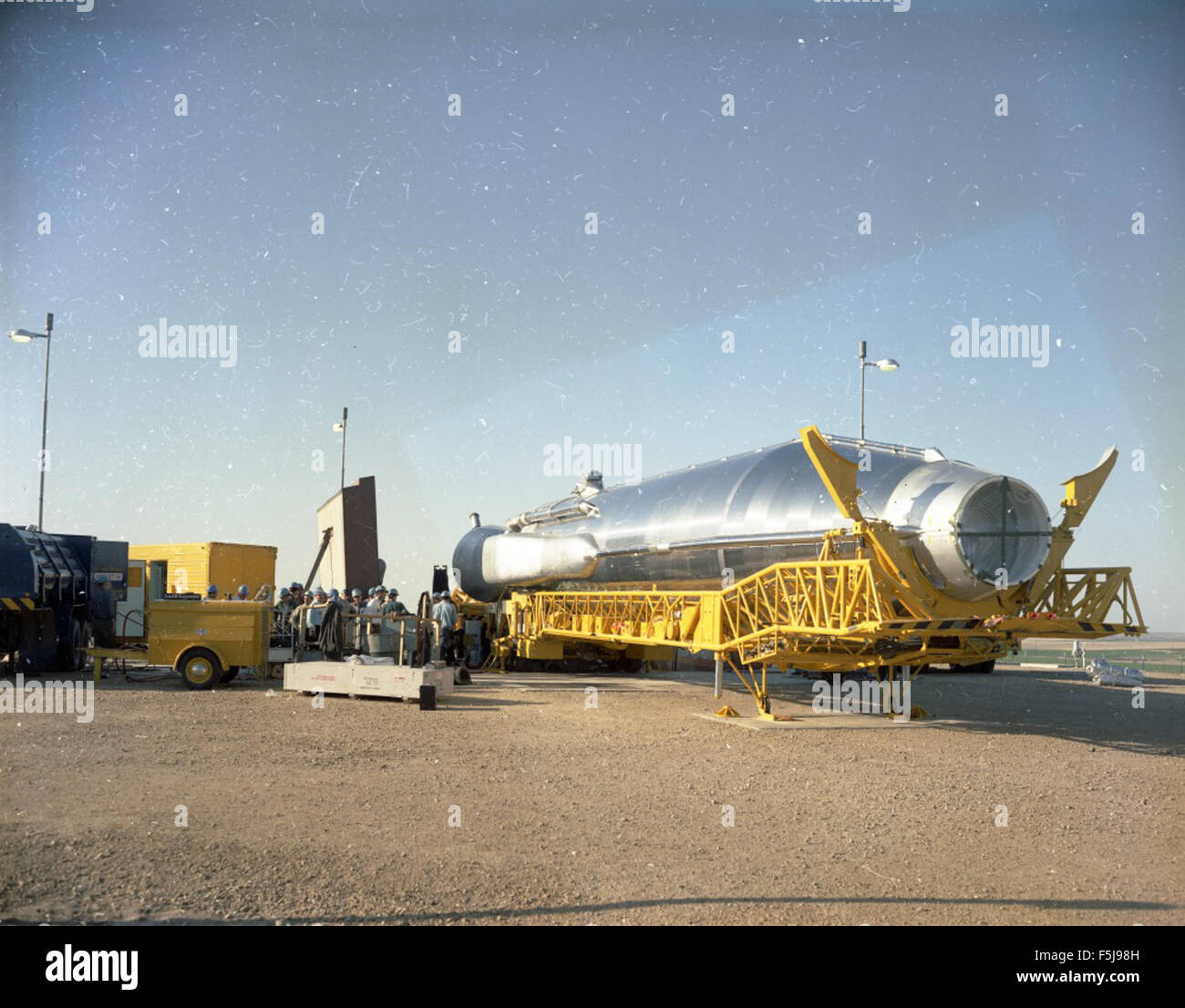 The Atlas ICBM is positioned in its silo, ready for deployment. The ...