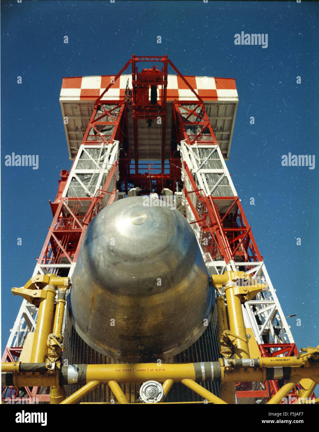 The image shows the details of the erection of the Atlas 12A, including ...