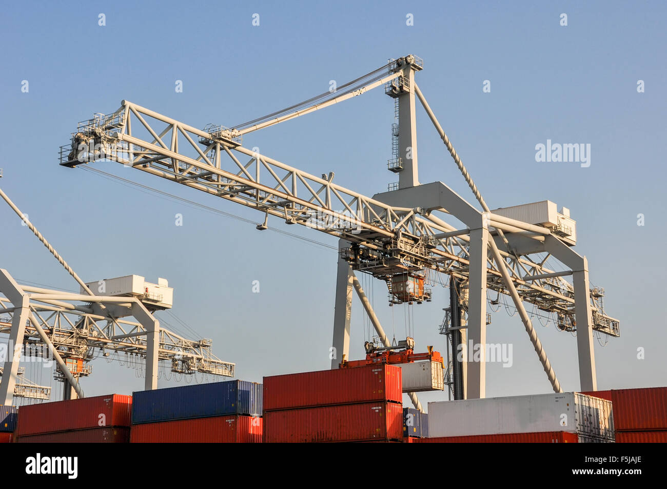sea cargo port large cranes Stock Photo - Alamy