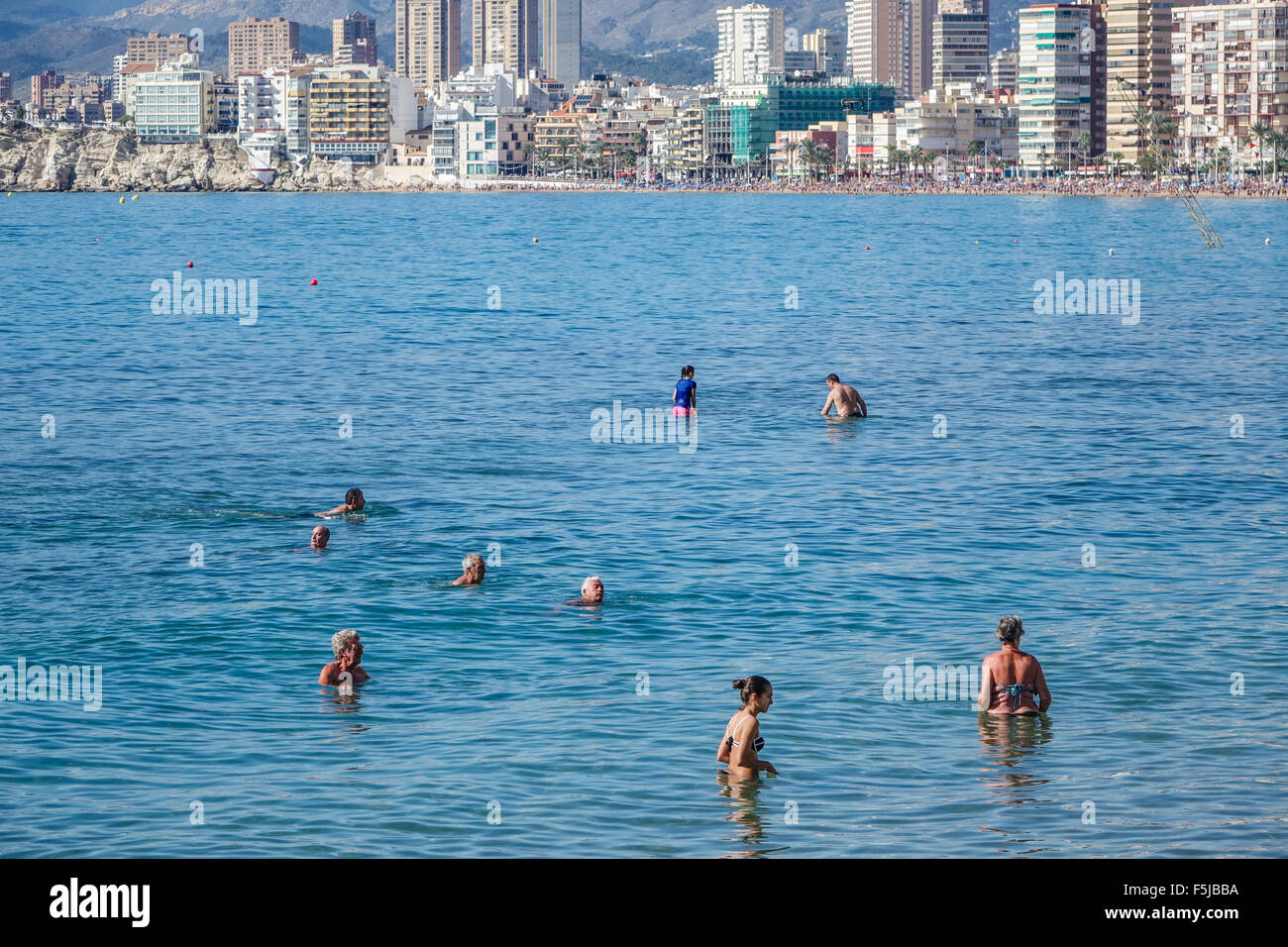 Benidorm,Spain. 5th November, 2015.Spanish weather. Tourists swim and ...