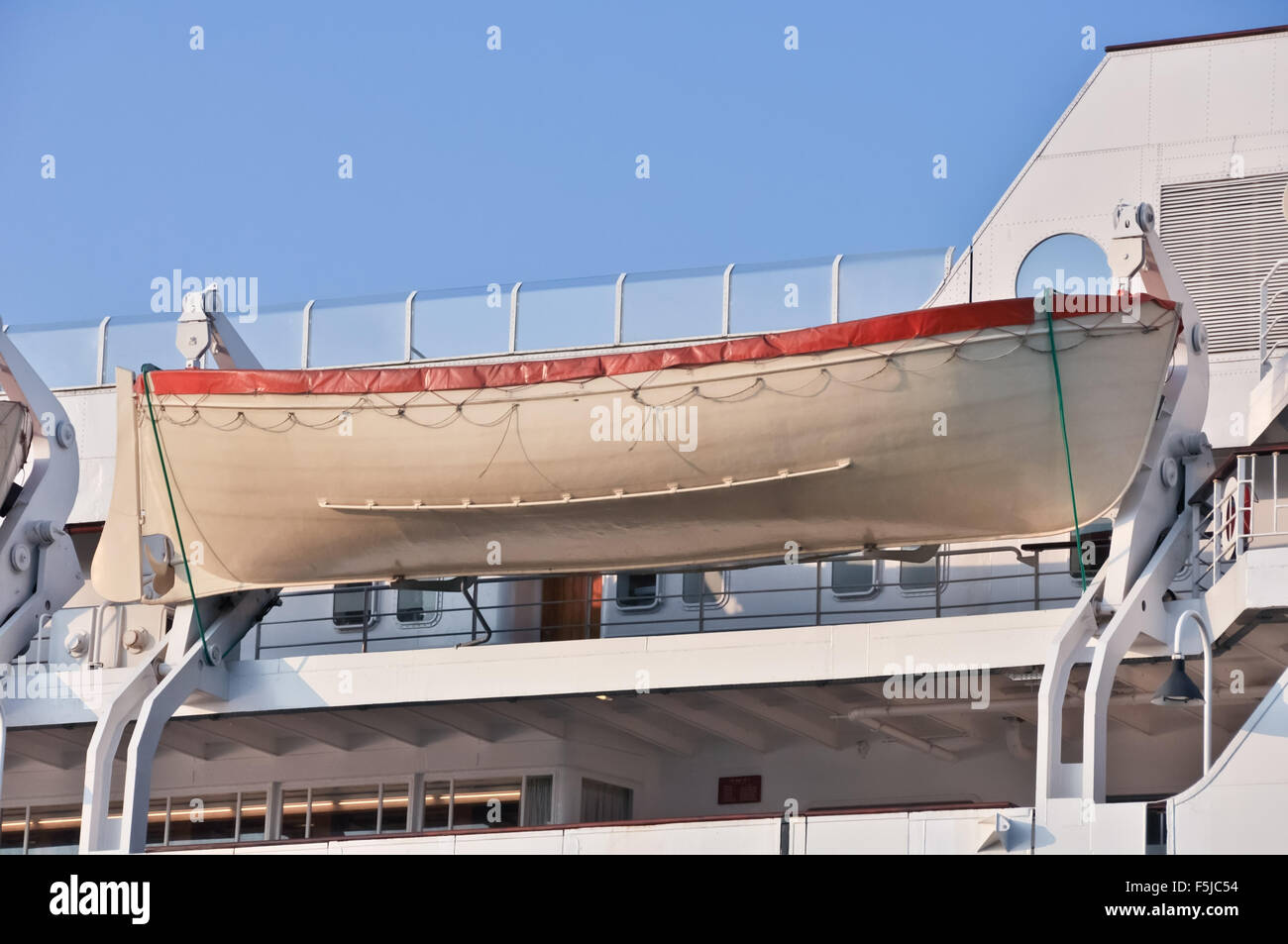 the large lifeboat aboard a cargo ship Stock Photo - Alamy