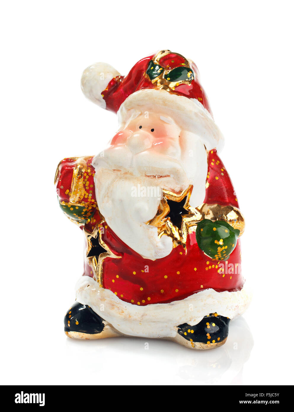 Santa claus green gift Cut Out Stock Images & Pictures - Alamy