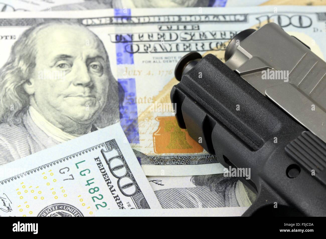Weapons and Money Stock Photo - Alamy