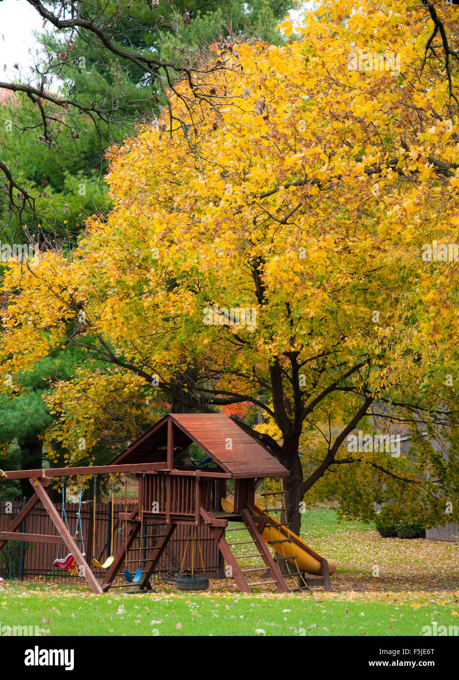 Children playground in fall Stock Photo - Alamy