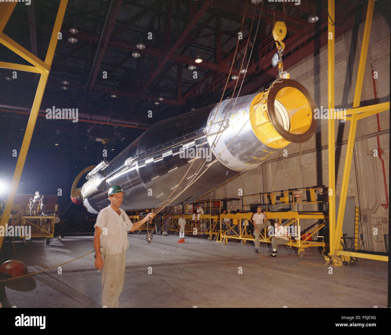The image depicts the transfer of the Atlas Booster 263D to Project ...