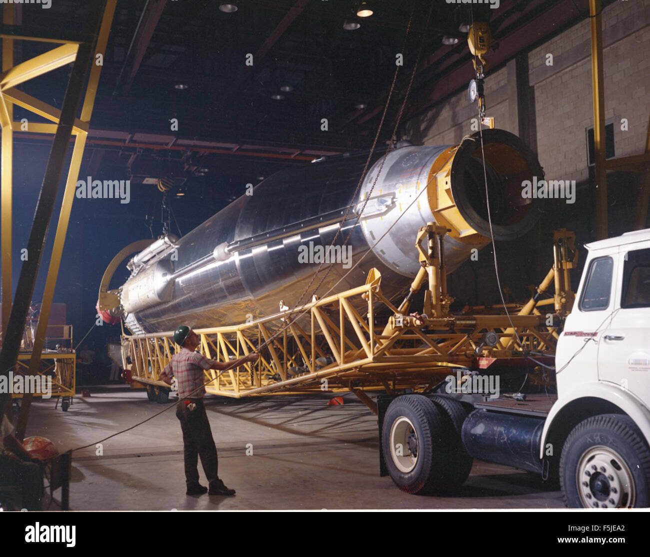 A photograph depicting the transfer of Atlas Booster 263D as part of ...