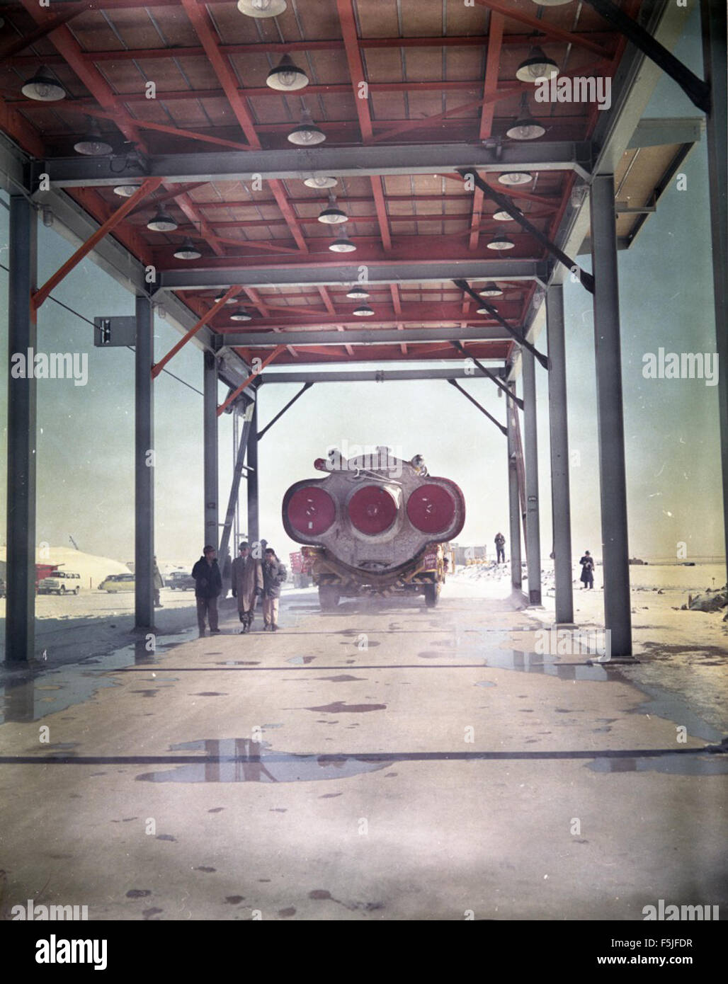 The image captures the first Atlas missile being transported to Site ...