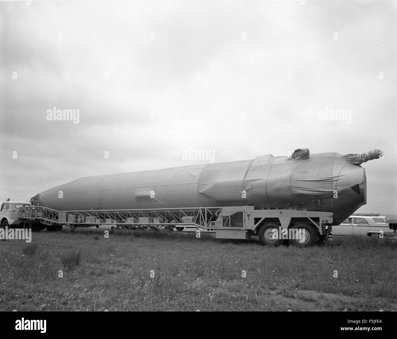 An image depicting the transport of a missile and trailer, with a full ...