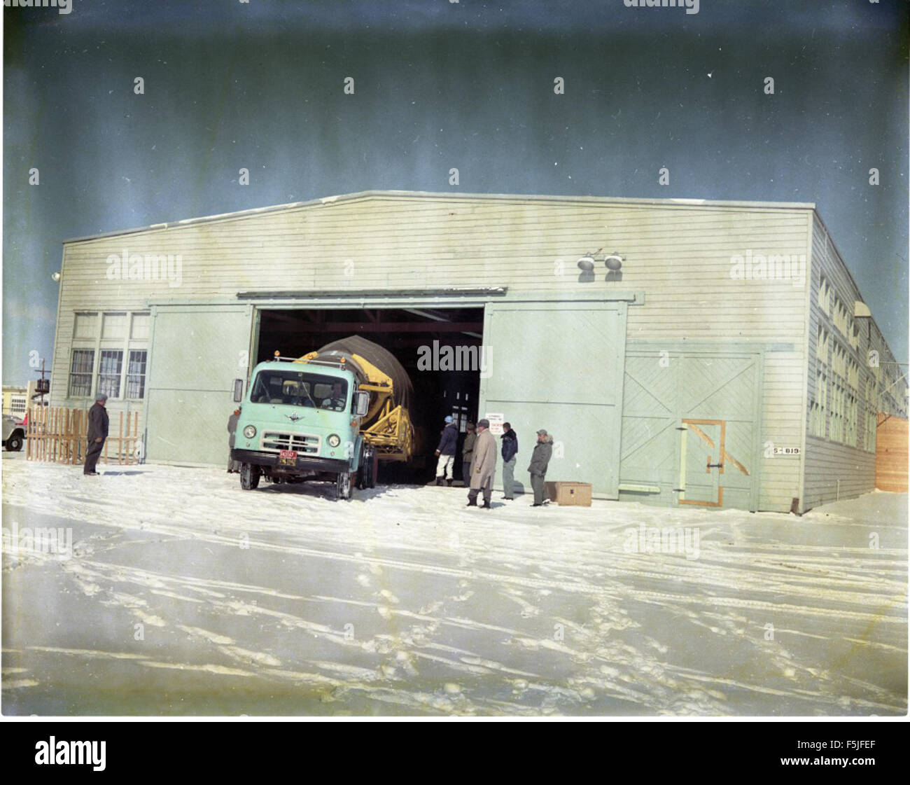 The image shows the first Atlas rocket being transported to Site 564-A ...