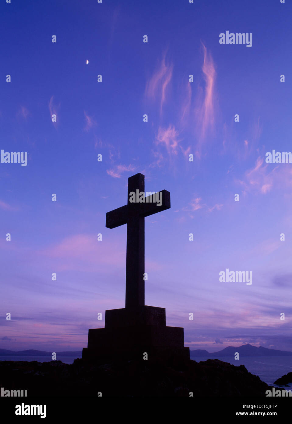 Modern cross marking the site of St Dwynwen's hermitage on Llanddwyn ...